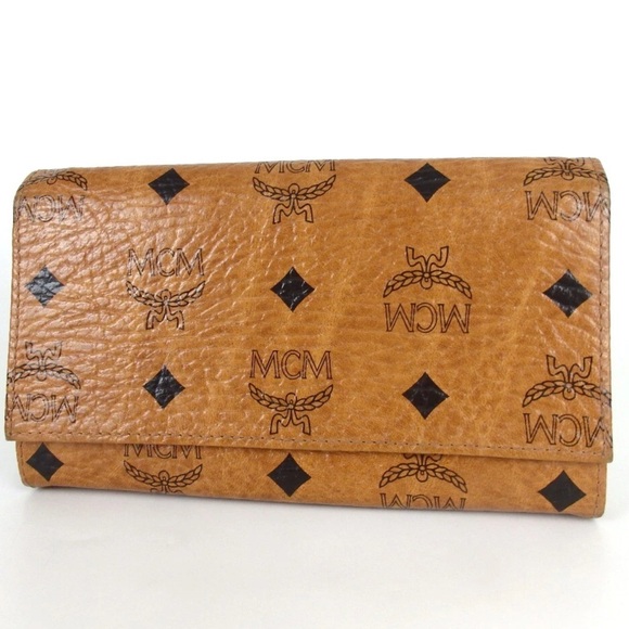 MCM | Bags | Mcm Tan And Black Leather Wallets With Iconic Monogram ...